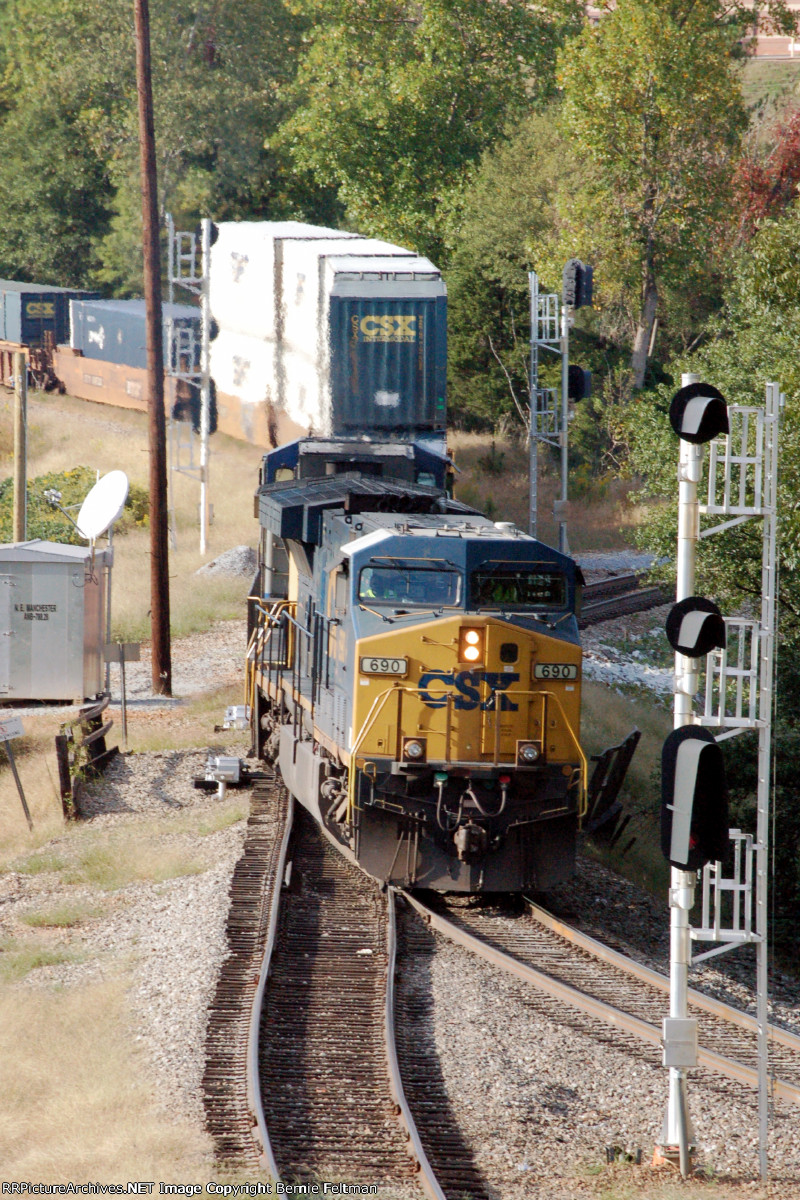CSX CW44-6 #690 and AC44CW #311 lead a southbound from the Lineville Subdivision to the ...